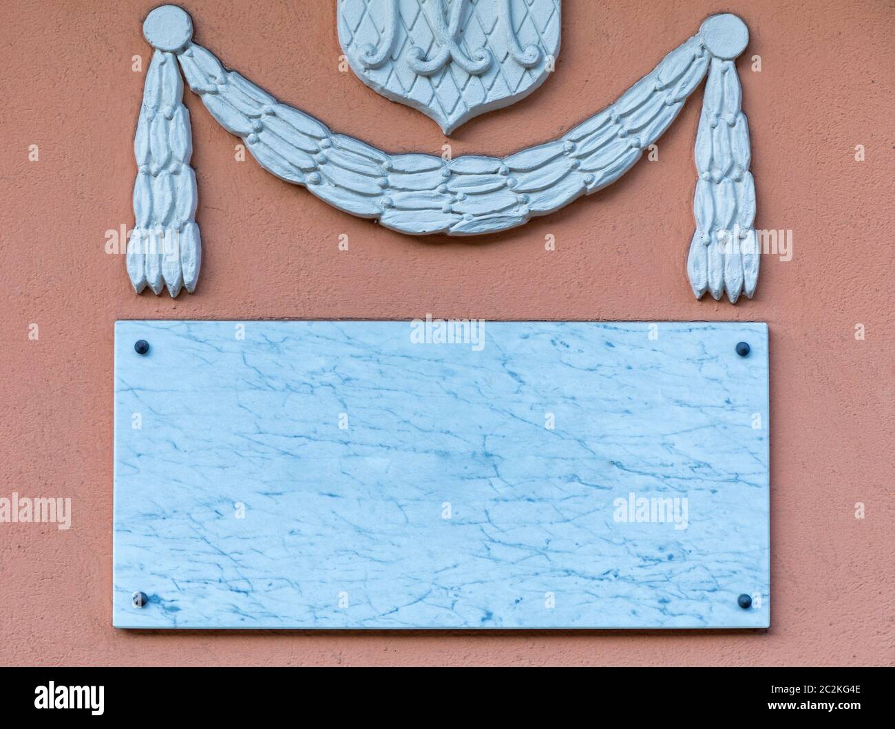 White Marble Plaque Memorial at Wall Empty Space Stock Photo - Alamy