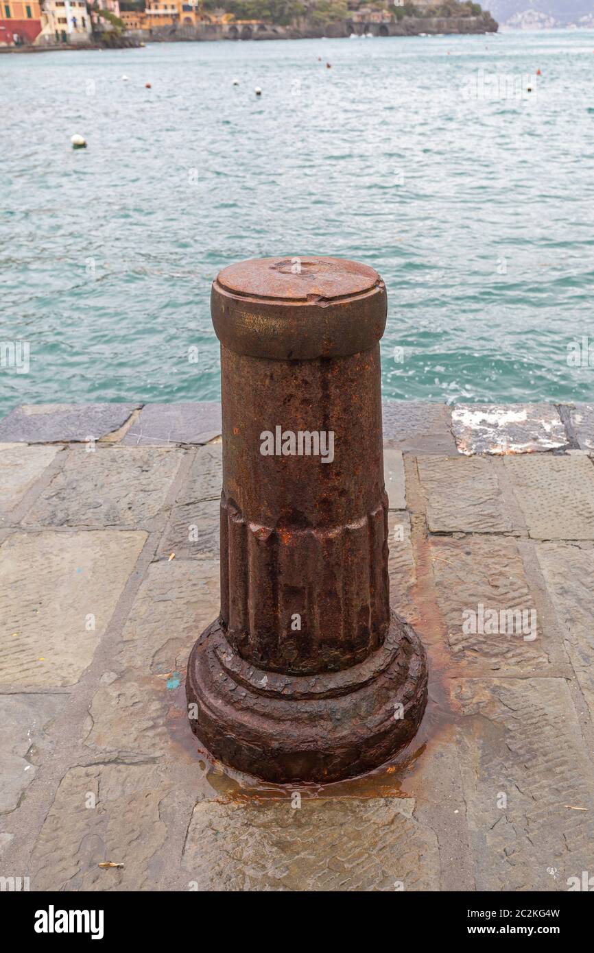 Big Rusty Mooring Bollard at Dock in Italy Stock Photo - Alamy