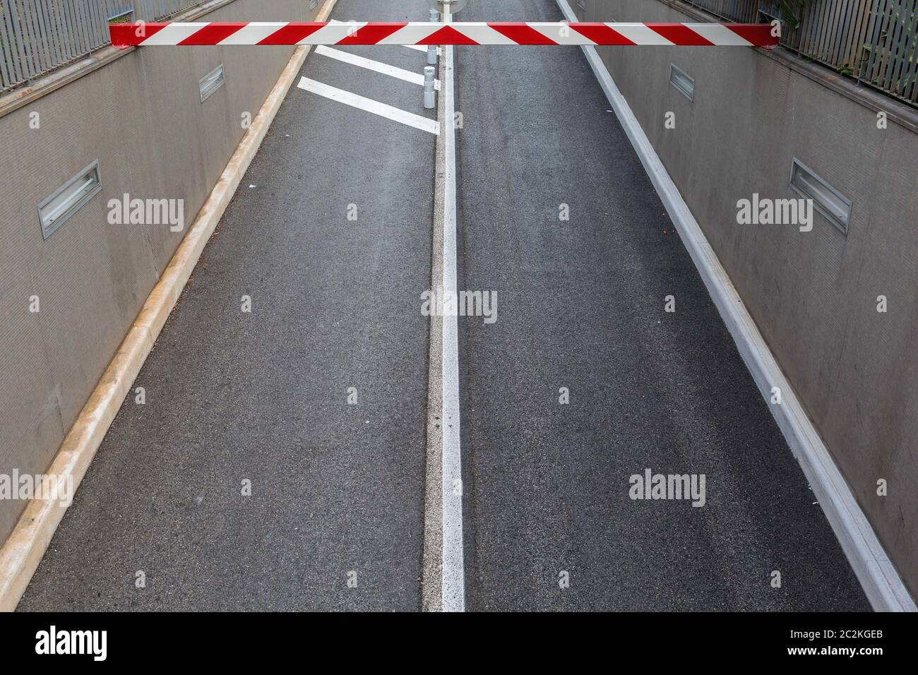 Two Way Road to Underground Parking Garage Stock Photo - Alamy