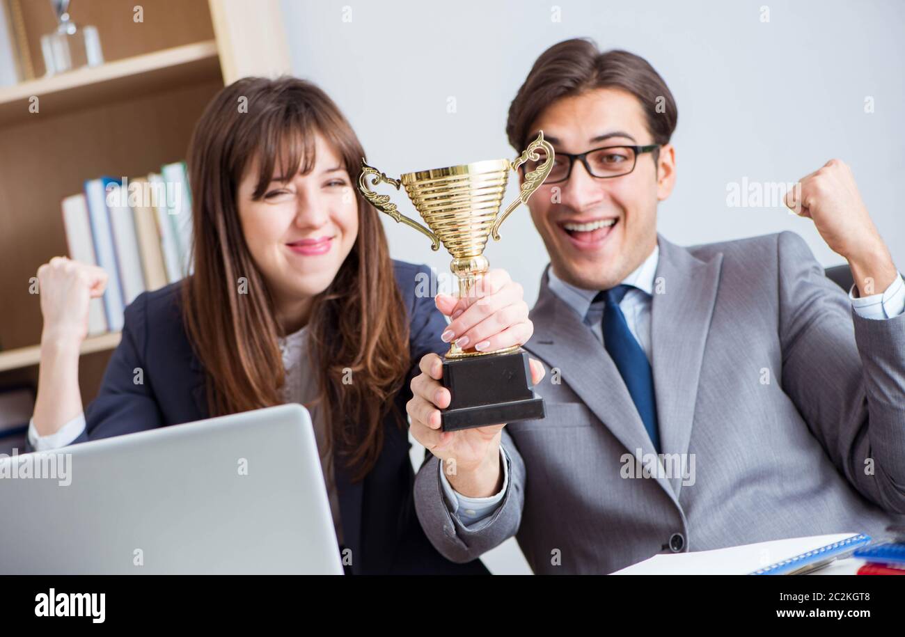 The concept of teamwork with prize Stock Photo - Alamy