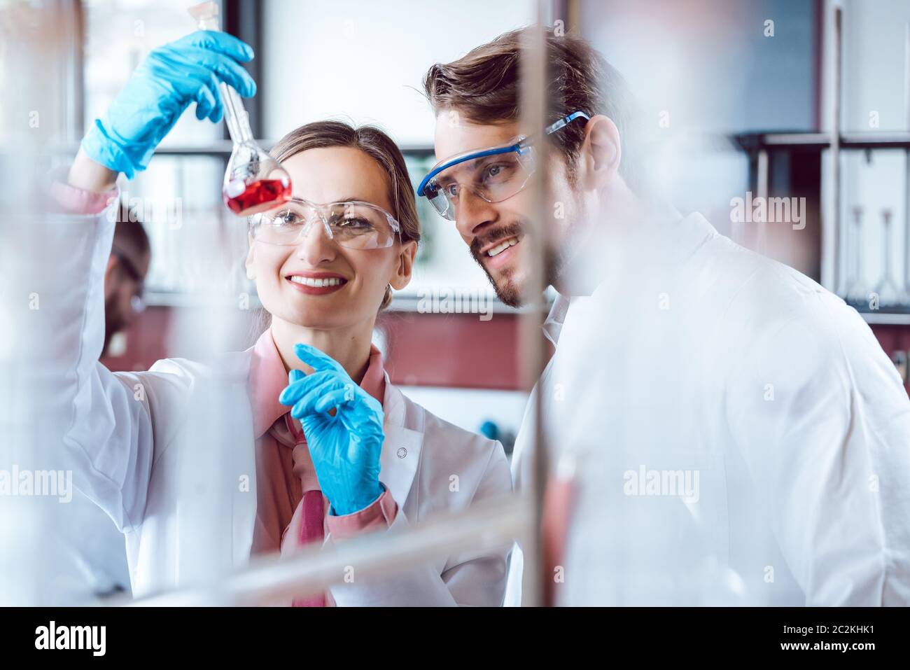 Two happy chemical scientists during breakthrough experiment Stock ...