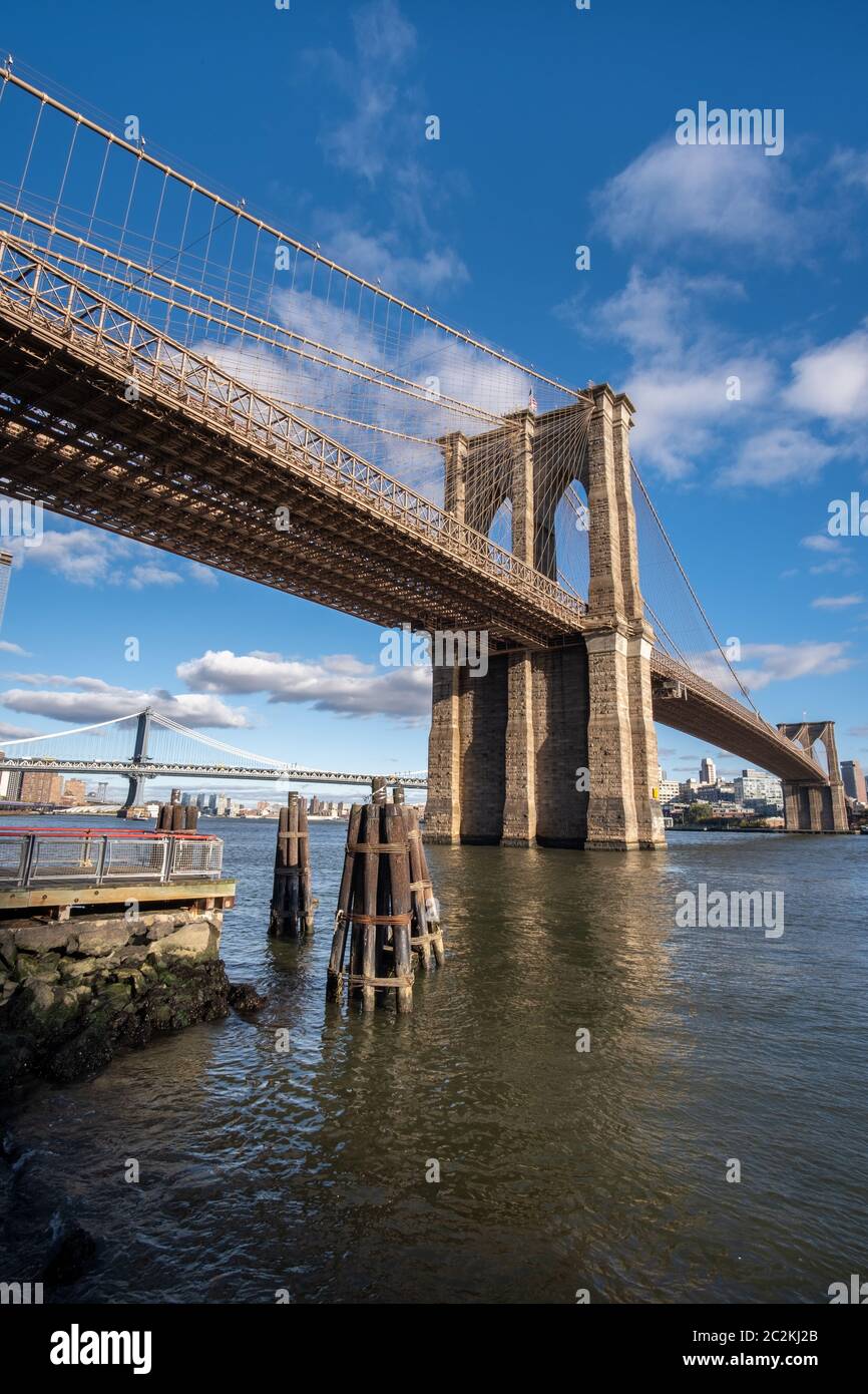 Brooklyn Bridge in daylight view from Lower East Side waterfront Stock ...