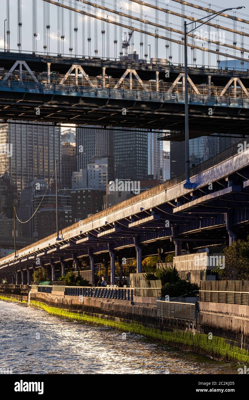 Manhattan Bridge in daylight view from Lower East Side waterfront Stock ...