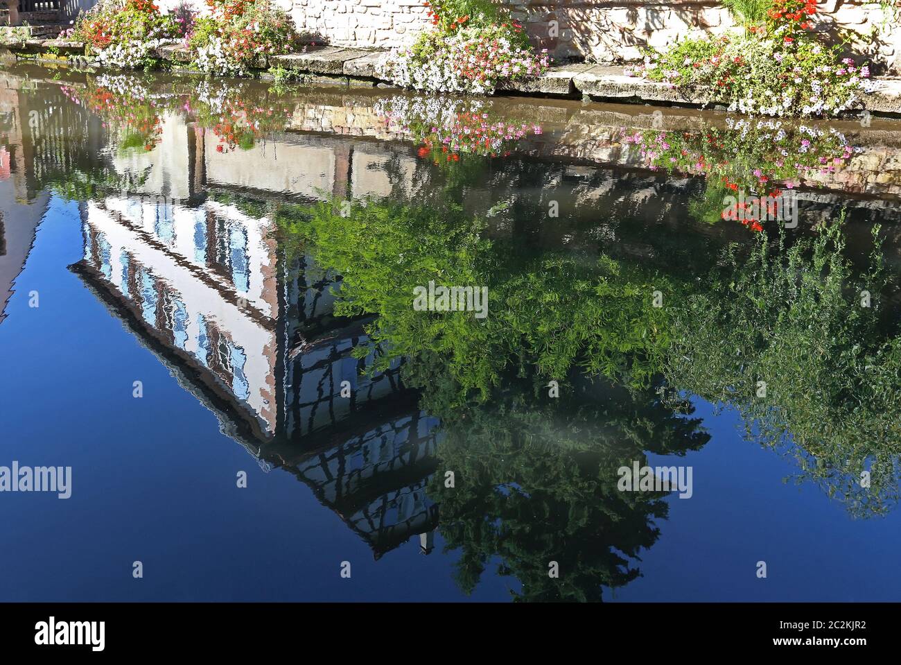 Water reflection, half-timbered house Stock Photo - Alamy