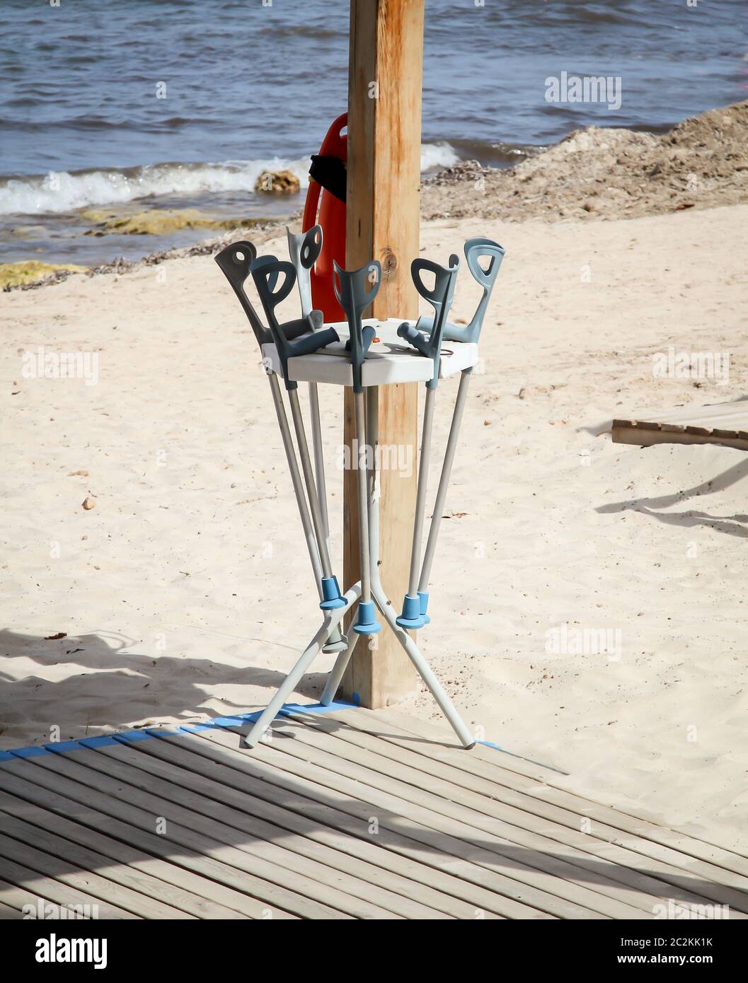 Crutches on beach hi-res stock photography and images - Alamy