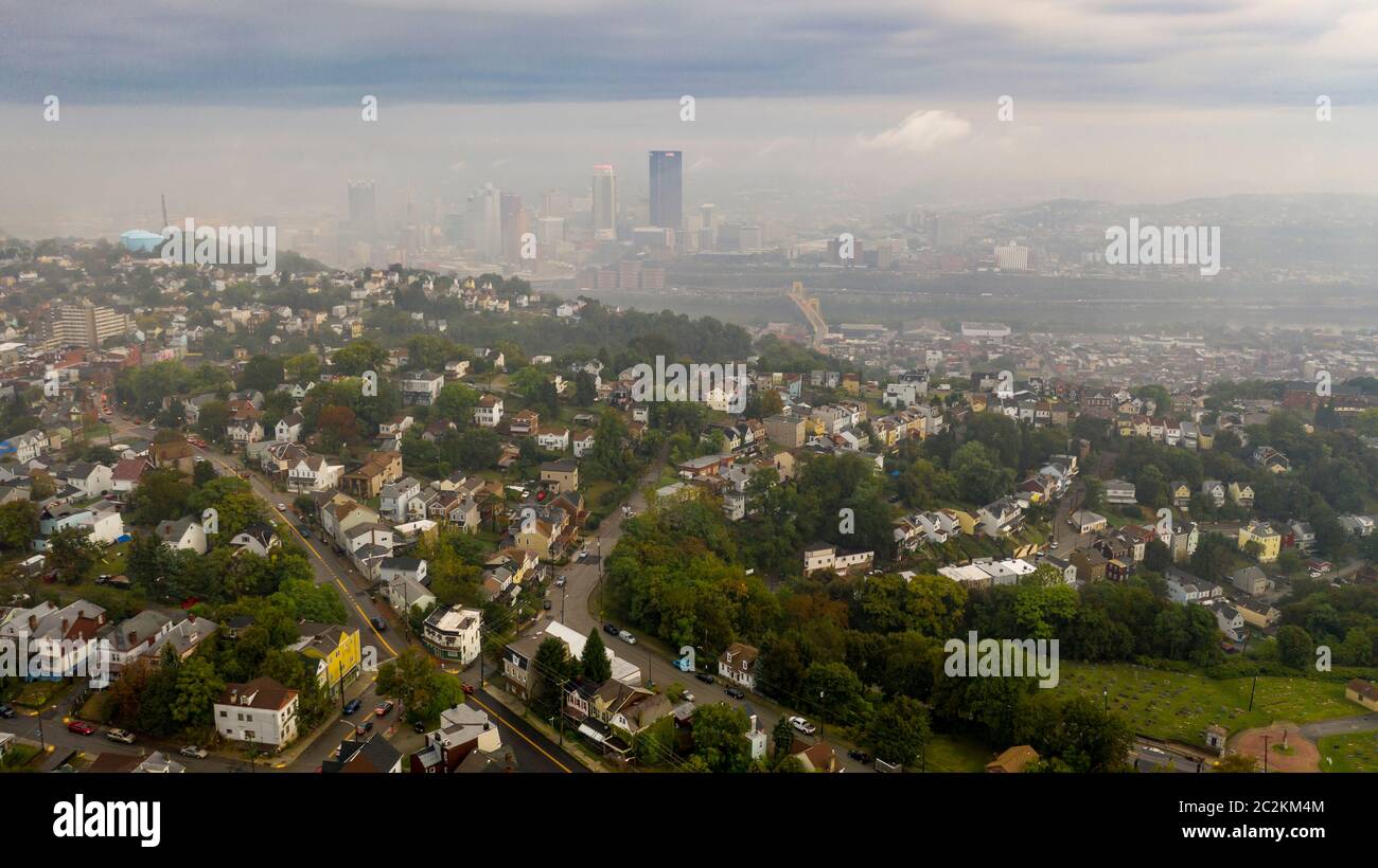 A thick layer of fog still has not burned off over downtown Pittsburgh ...