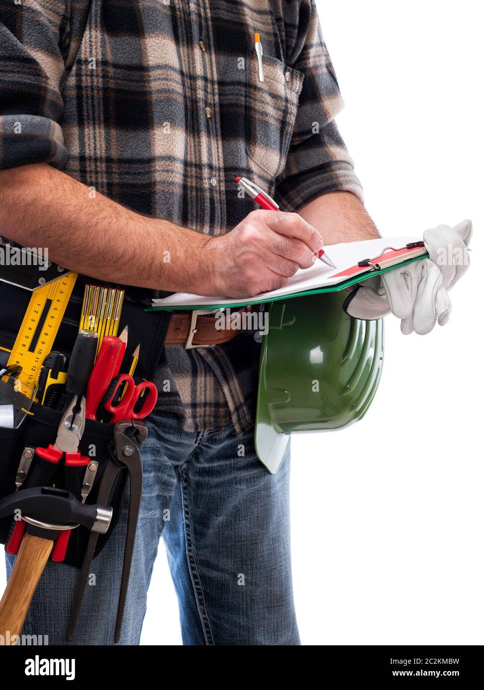 Carpenter isolated on white background writes work notes on a notebook ...