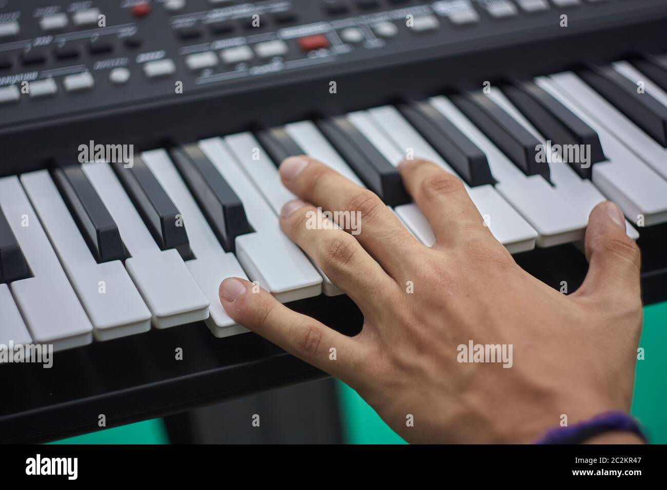 Piano pressing hi-res stock photography and images - Alamy
