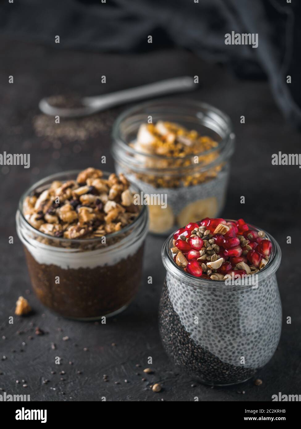 chia pudding set in different glass jars Stock Photo - Alamy