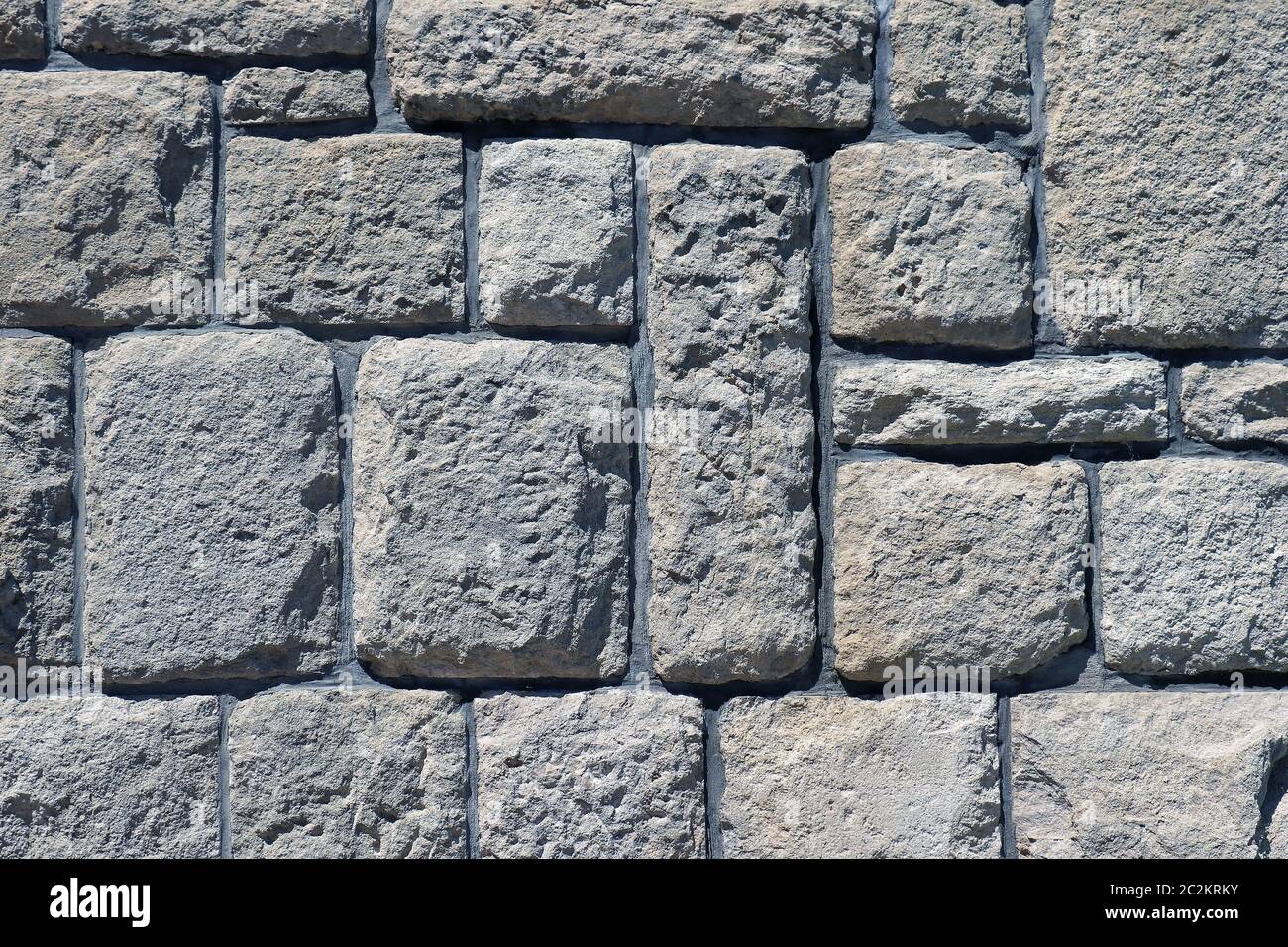 Grey stone block wall pattern and texture background Stock Photo - Alamy