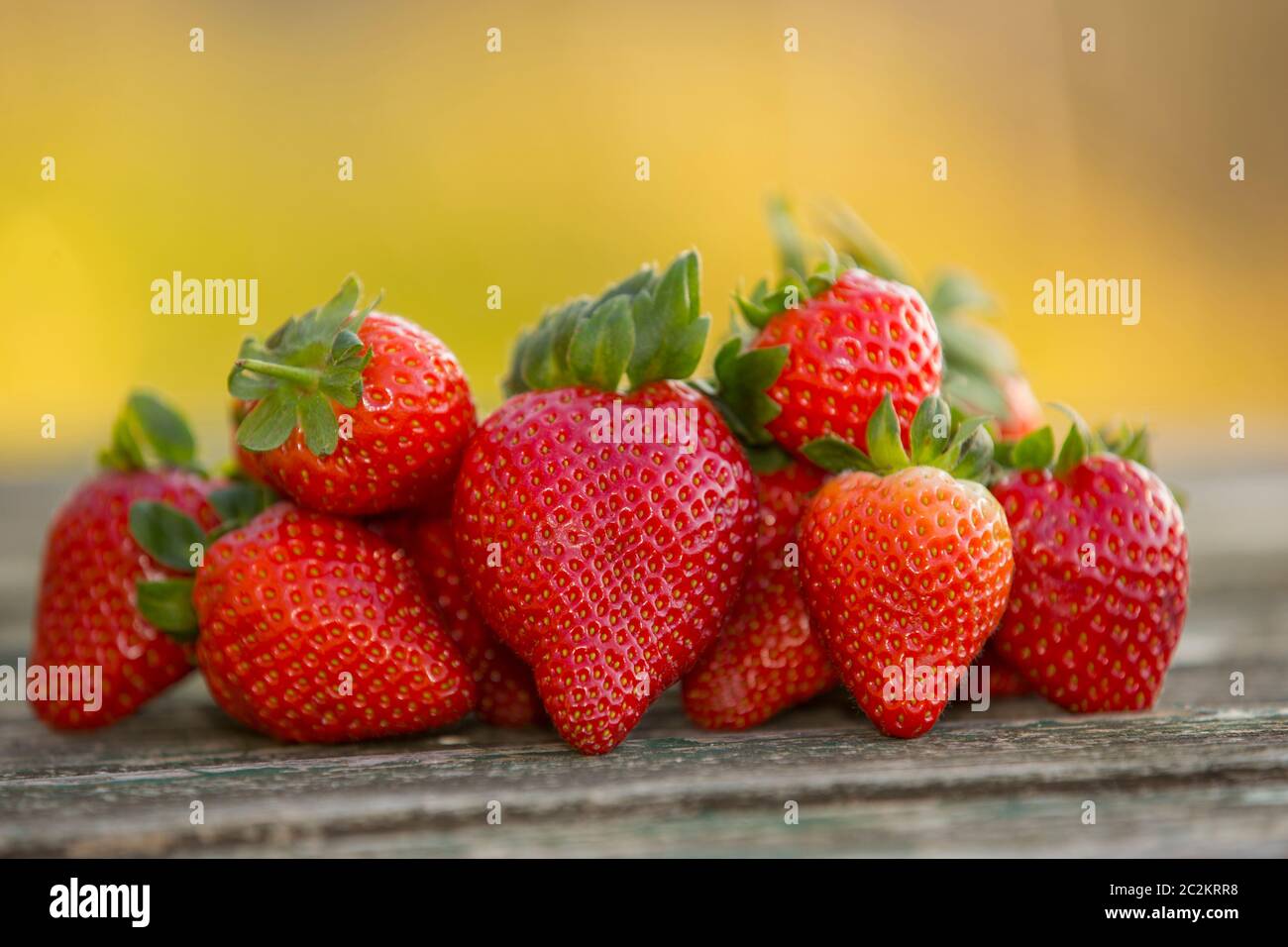 strawberries on garden's table, outdoor picture Stock Photo - Alamy