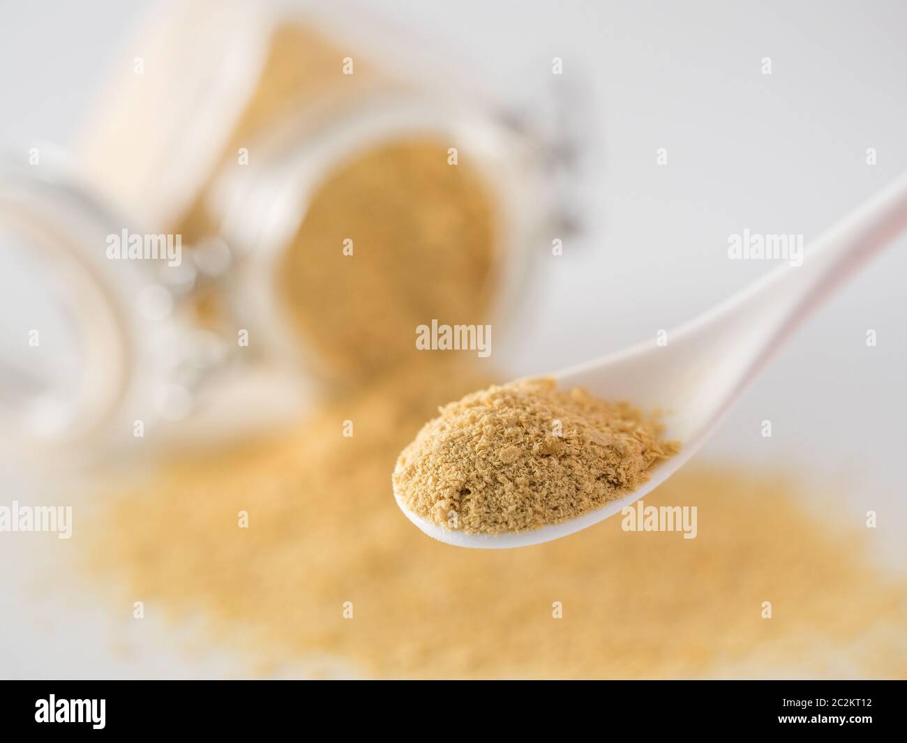 Nutritional inactive yeast in spoon Stock Photo - Alamy
