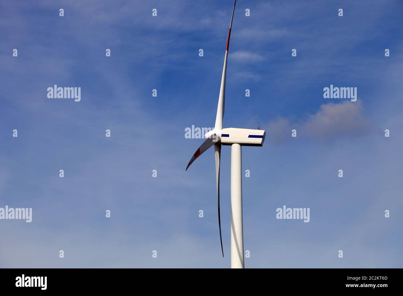 white wind turbine in the top of the mountain Stock Photo - Alamy
