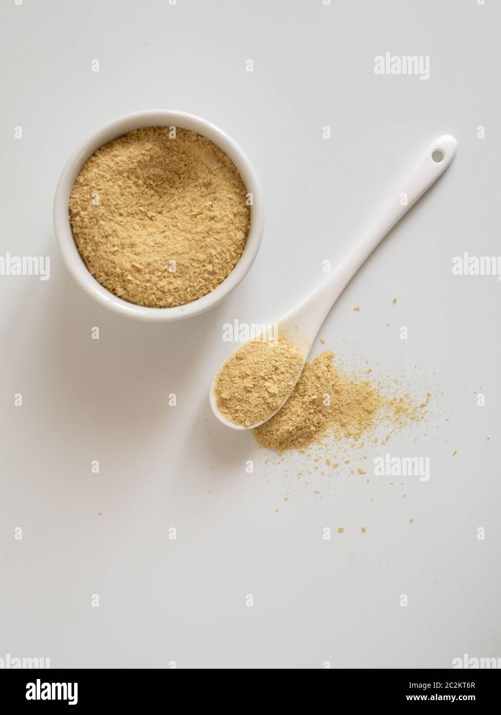 Nutritional inactive yeast top view Stock Photo - Alamy