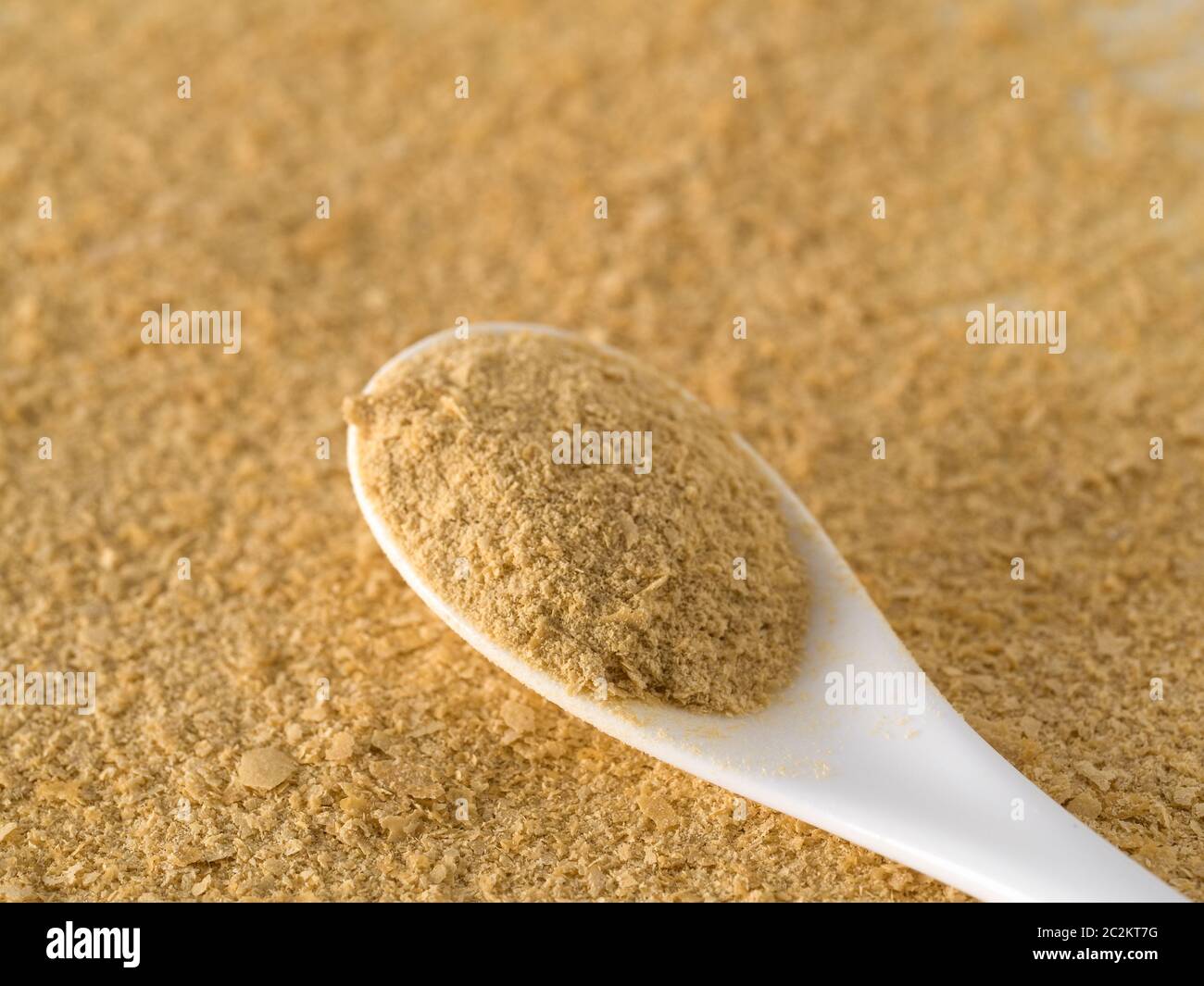 Nutritional inactive yeast top view Stock Photo - Alamy