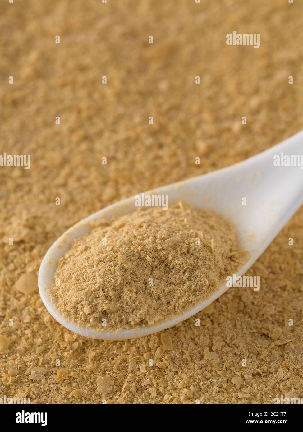 Nutritional inactive yeast top view Stock Photo - Alamy