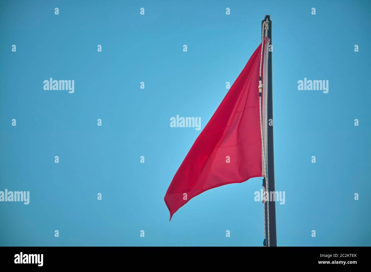 Pole raised red flag hi-res stock photography and images - Alamy