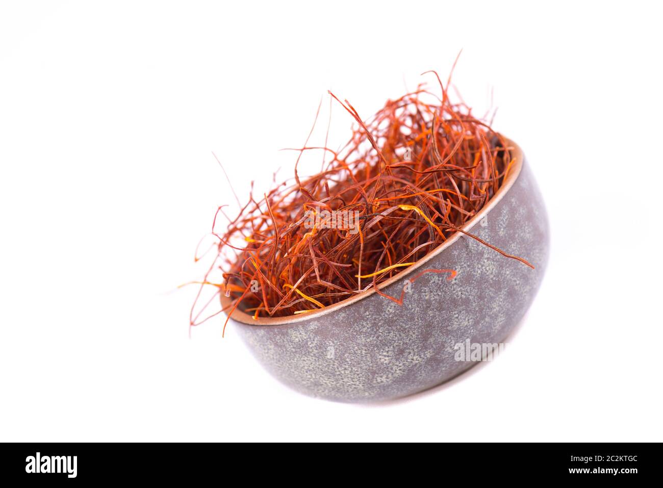 Chilli threads isolated on a white background Stock Photo - Alamy