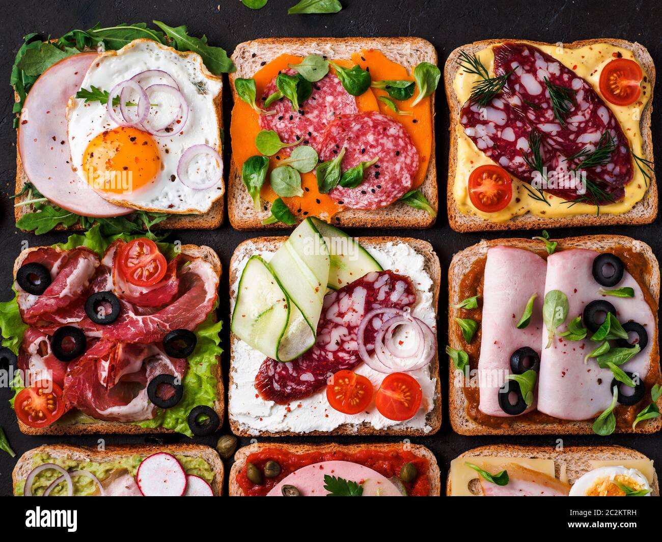 open sandwiches with different meat, top view Stock Photo - Alamy