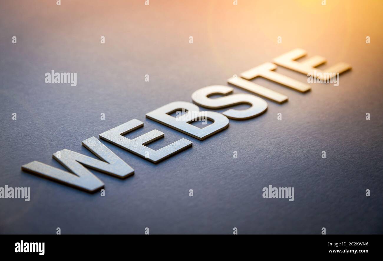 Word website written with white solid letters on a board Stock Photo ...
