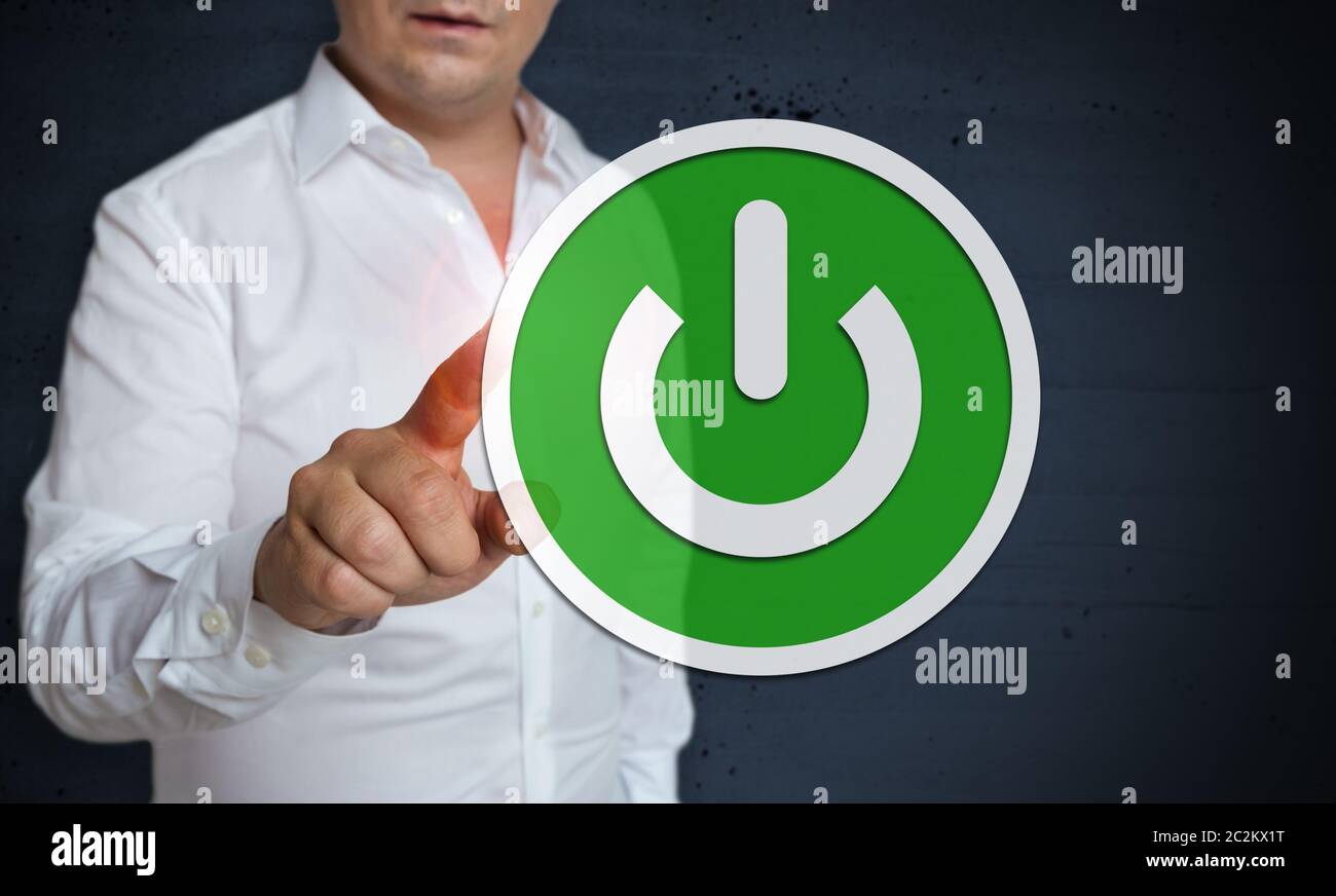 Power Button Touchscreen is operated by man concept Stock Photo - Alamy
