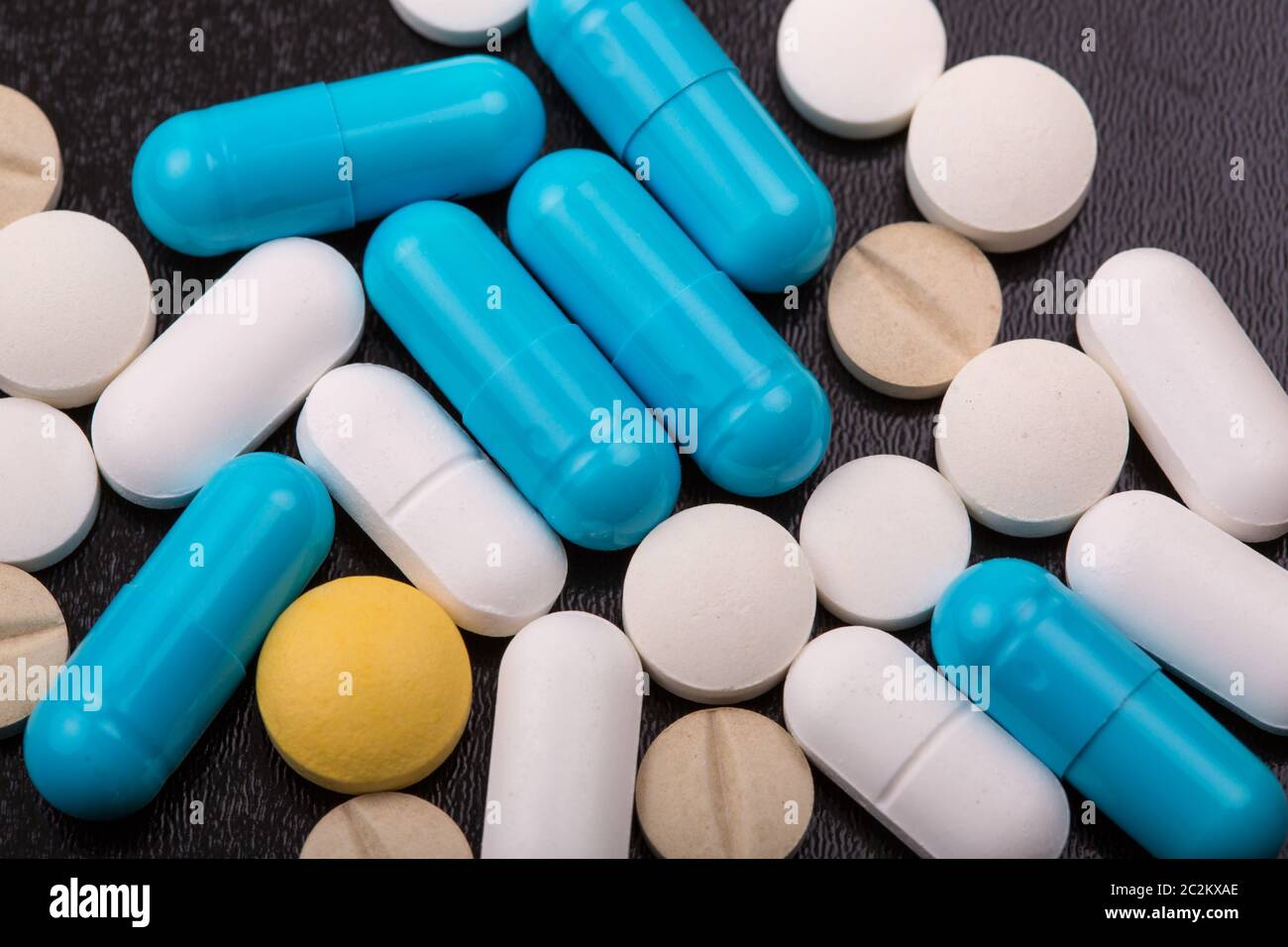 different tablets pills capsule heap mix therapy drugs Stock Photo - Alamy