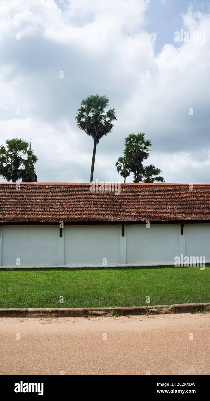 That inghang stupa temple Laos architecture wall grass Stock Photo - Alamy