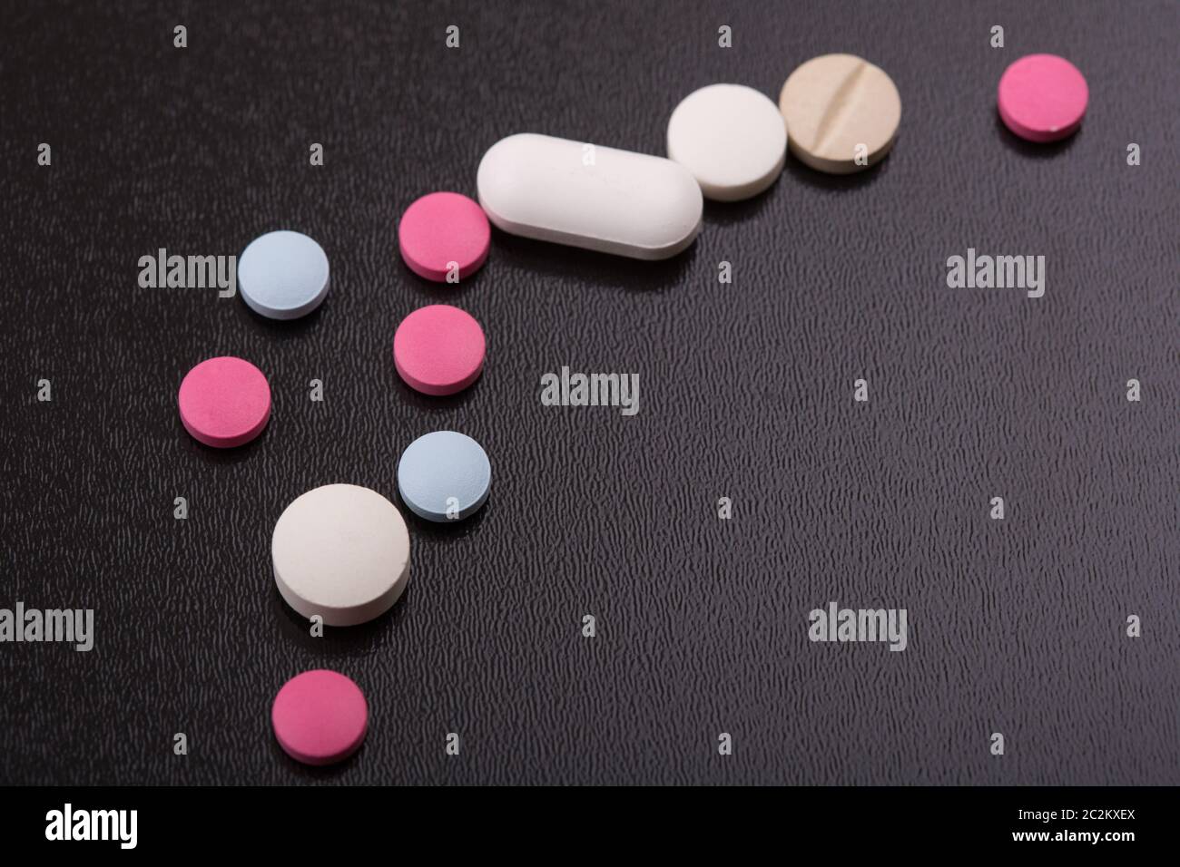 different tablets pills capsule heap mix therapy drugs Stock Photo - Alamy