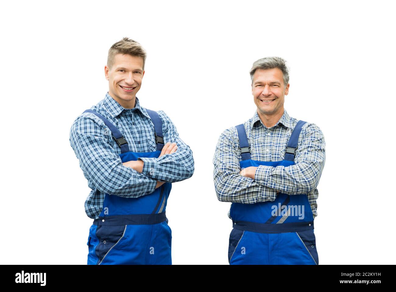Smiling Portrait Of Two Male Handymen With Arms Crossed Looking At ...