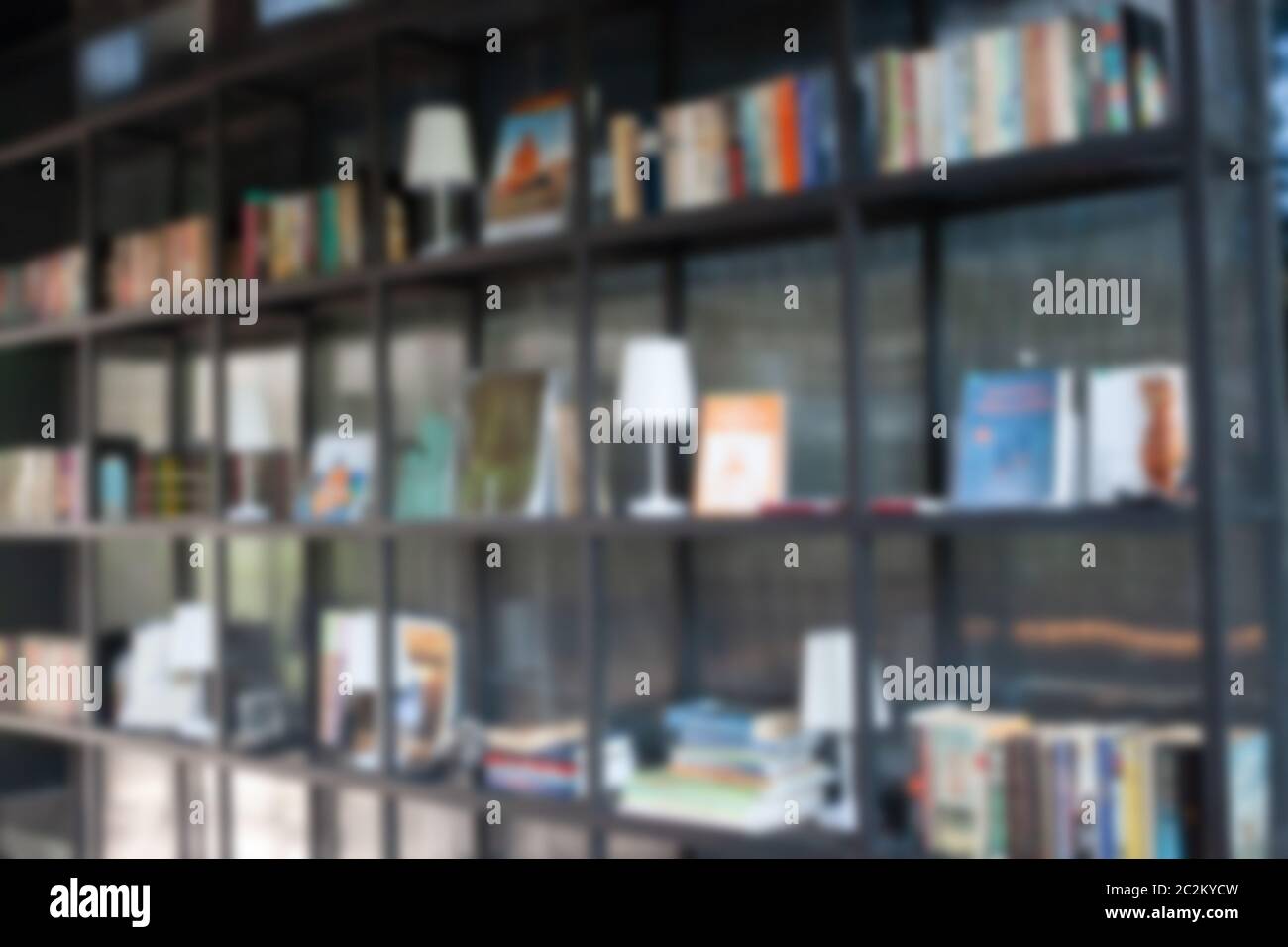 Blur book shelf in the living room Stock Photo - Alamy