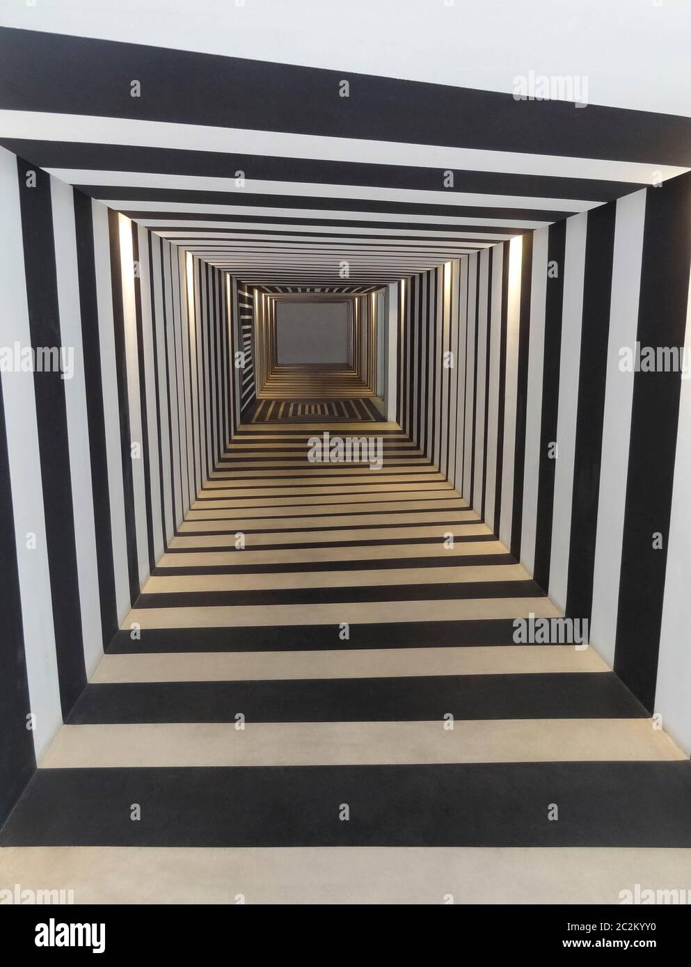 corridor painted with black and white stripes Stock Photo - Alamy