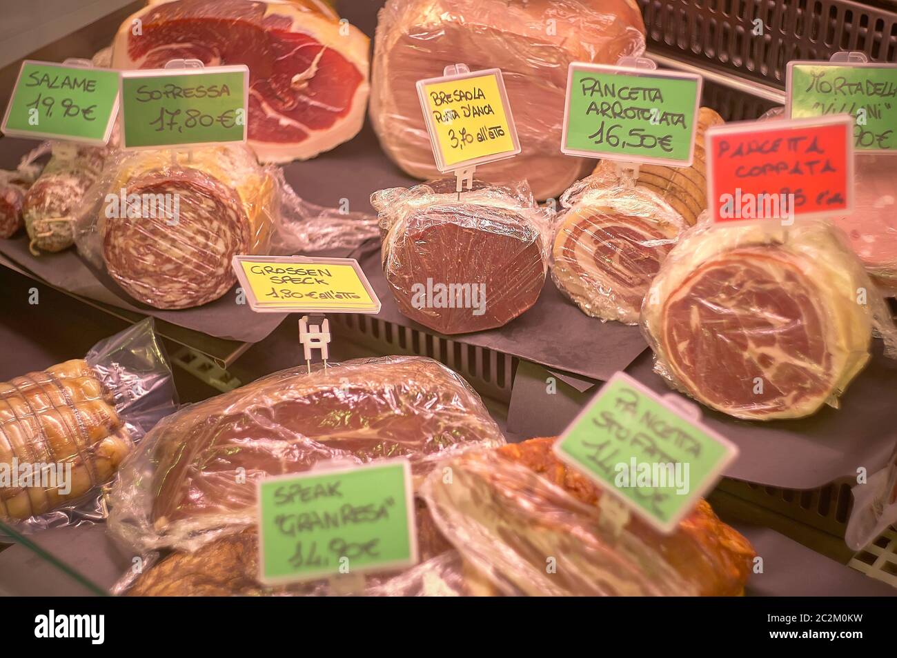 Lots of cold cuts inside the supermarket refrigerated counter ready to ...