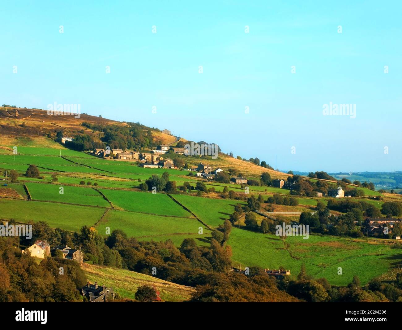 the village of wadsworth and surrounding hillside fields in the calder ...