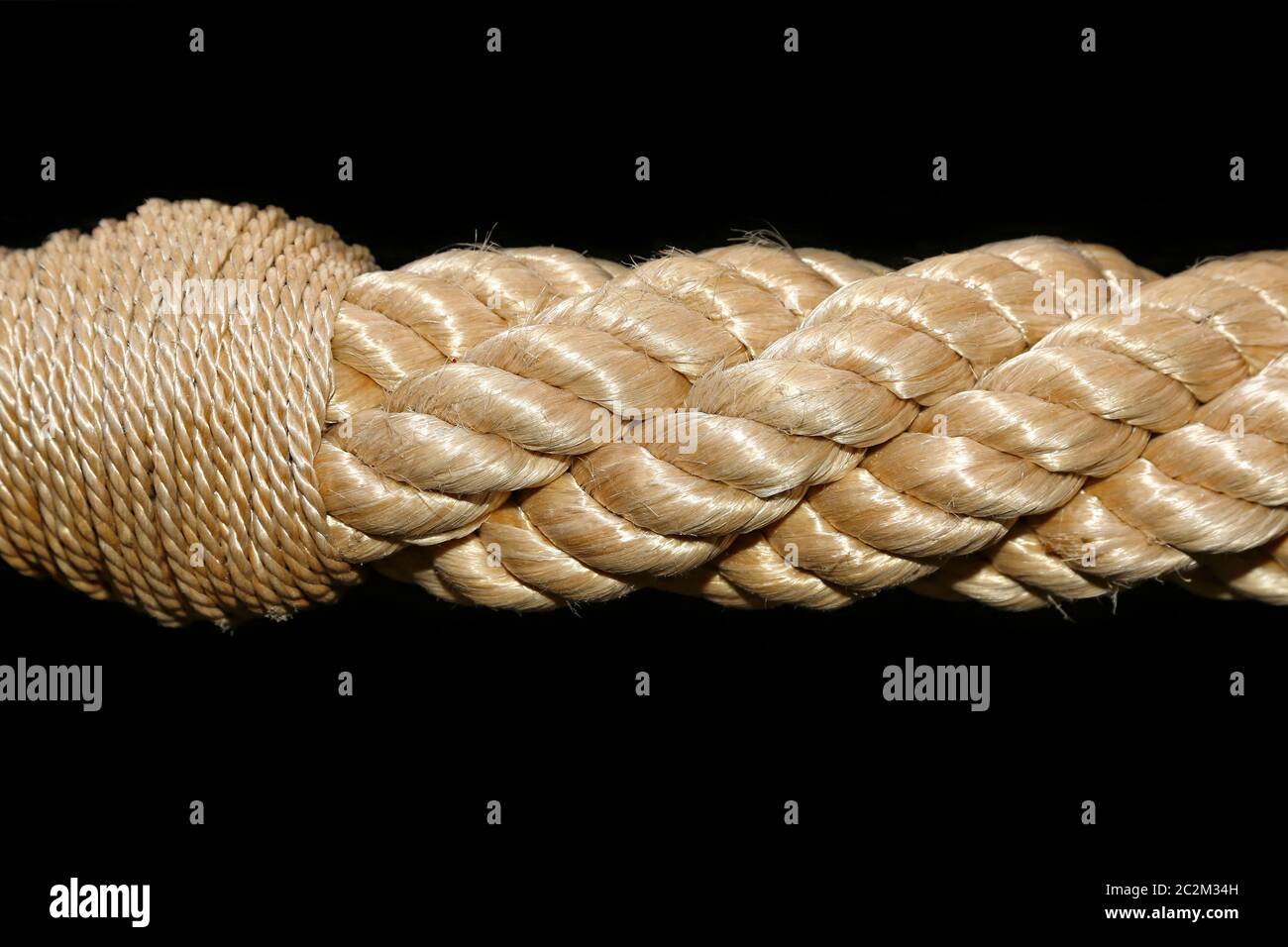 Synthetic thick rope for nautical vessel Stock Photo - Alamy