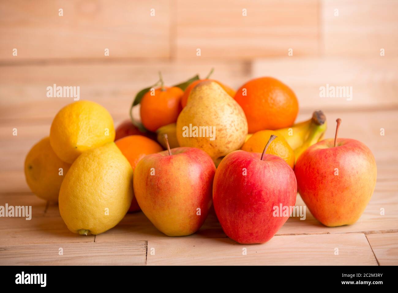 fruits on wooden table, studio picture Stock Photo - Alamy