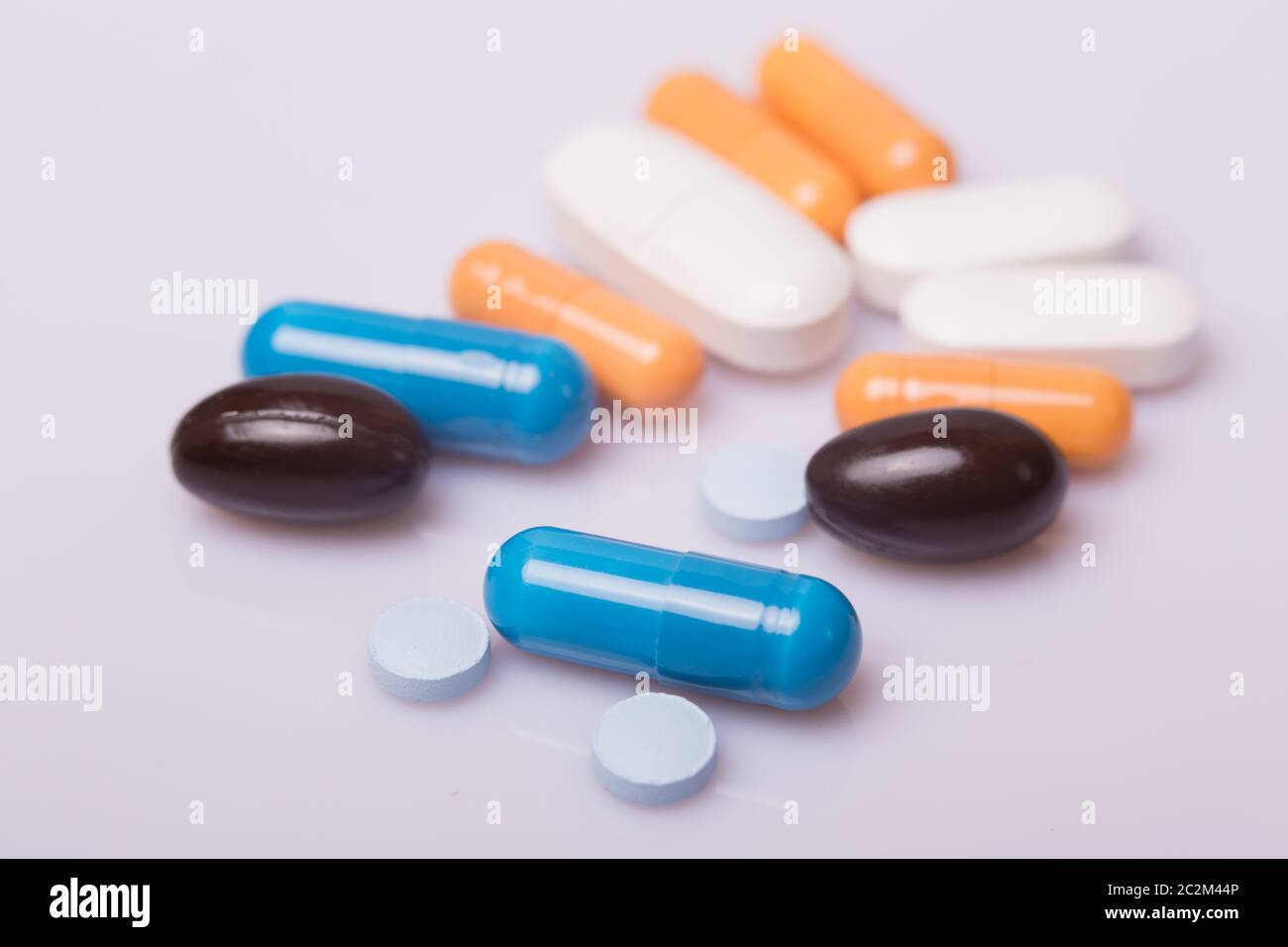 different Tablets pills capsule heap mix therapy drugs Stock Photo - Alamy
