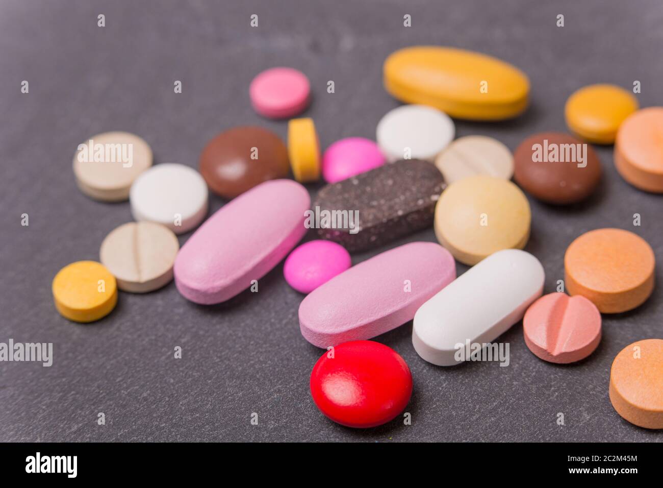 different Tablets pills capsule heap mix therapy drugs Stock Photo - Alamy