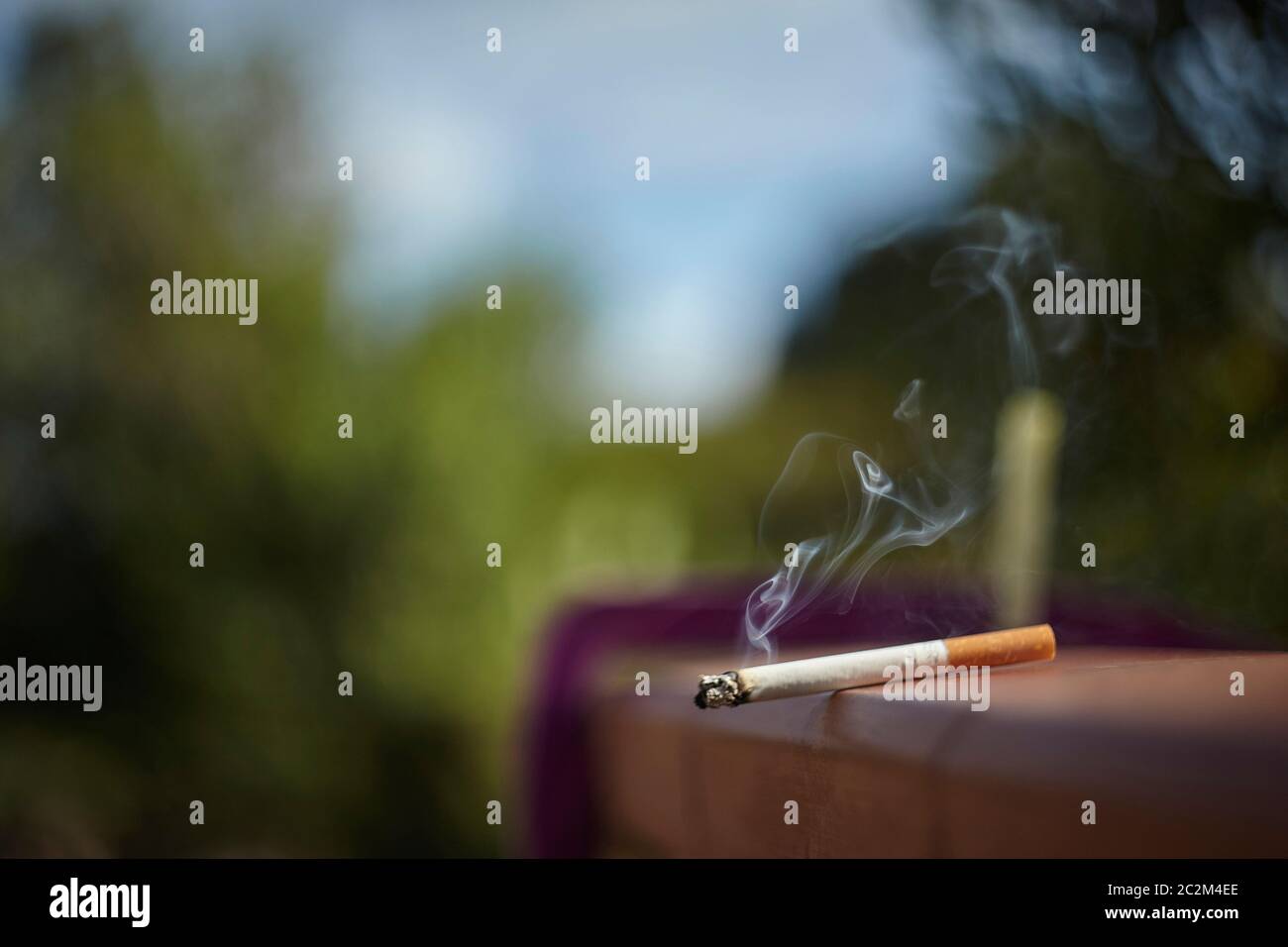 Cigarette lit hi-res stock photography and images - Alamy