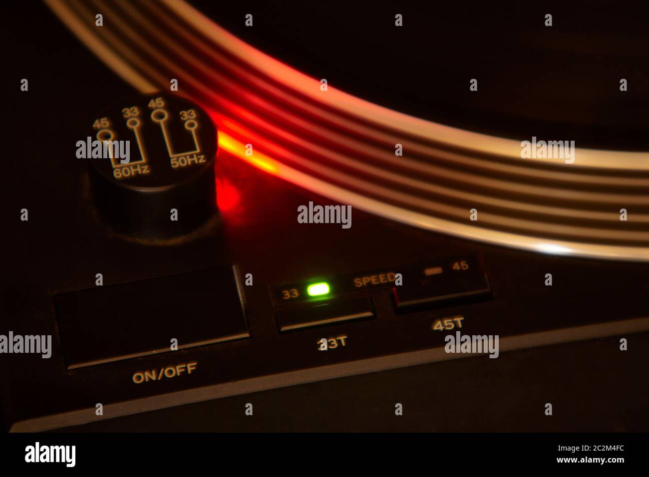 Switches on and off and rotation speed of an old turntable for vintage ...
