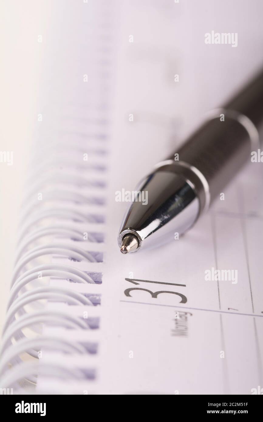an Organlizer and a pen Stock Photo - Alamy