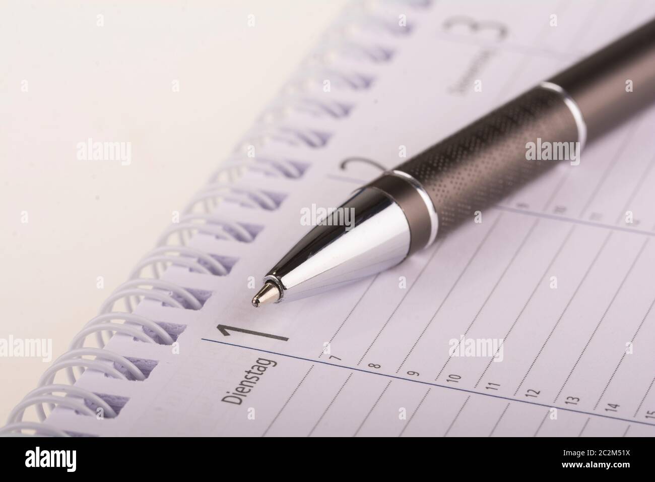 an Organlizer and a pen Stock Photo - Alamy