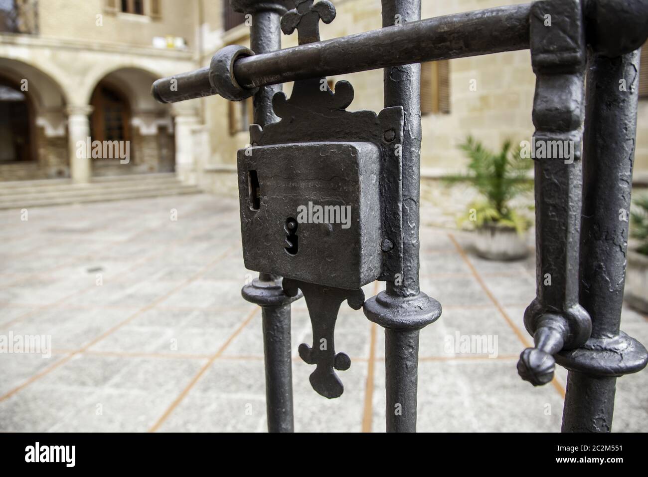 Old metal lock on a door, security detail Stock Photo - Alamy