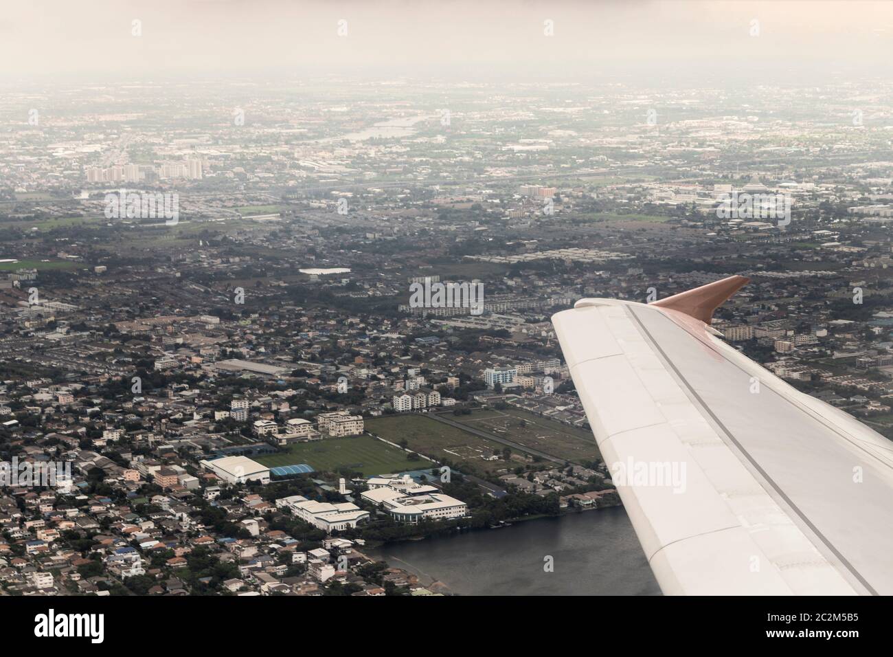 Flight and view over Bangkok in Thailand with nice city panorama from ...
