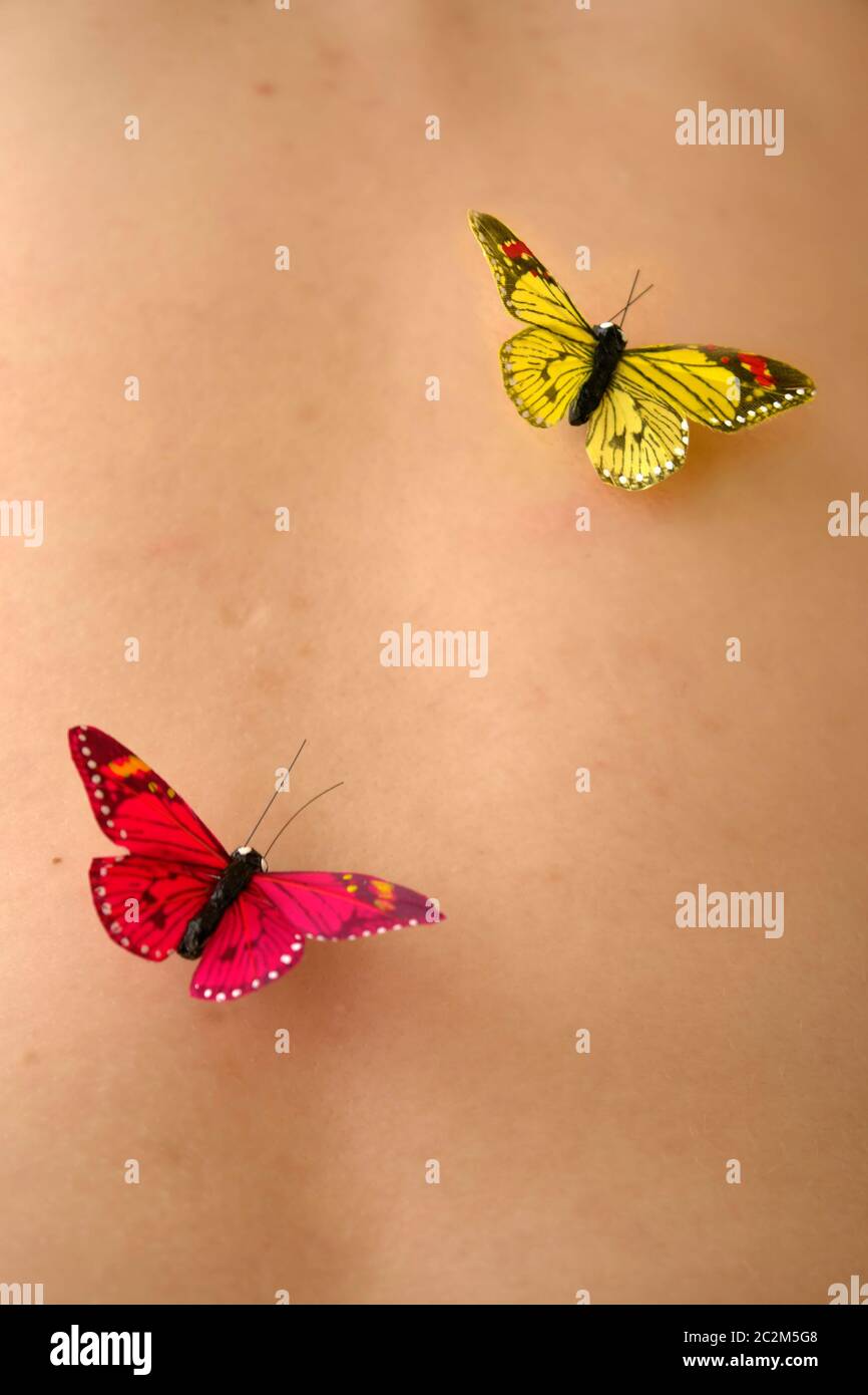 butterflys in woman skin Stock Photo - Alamy