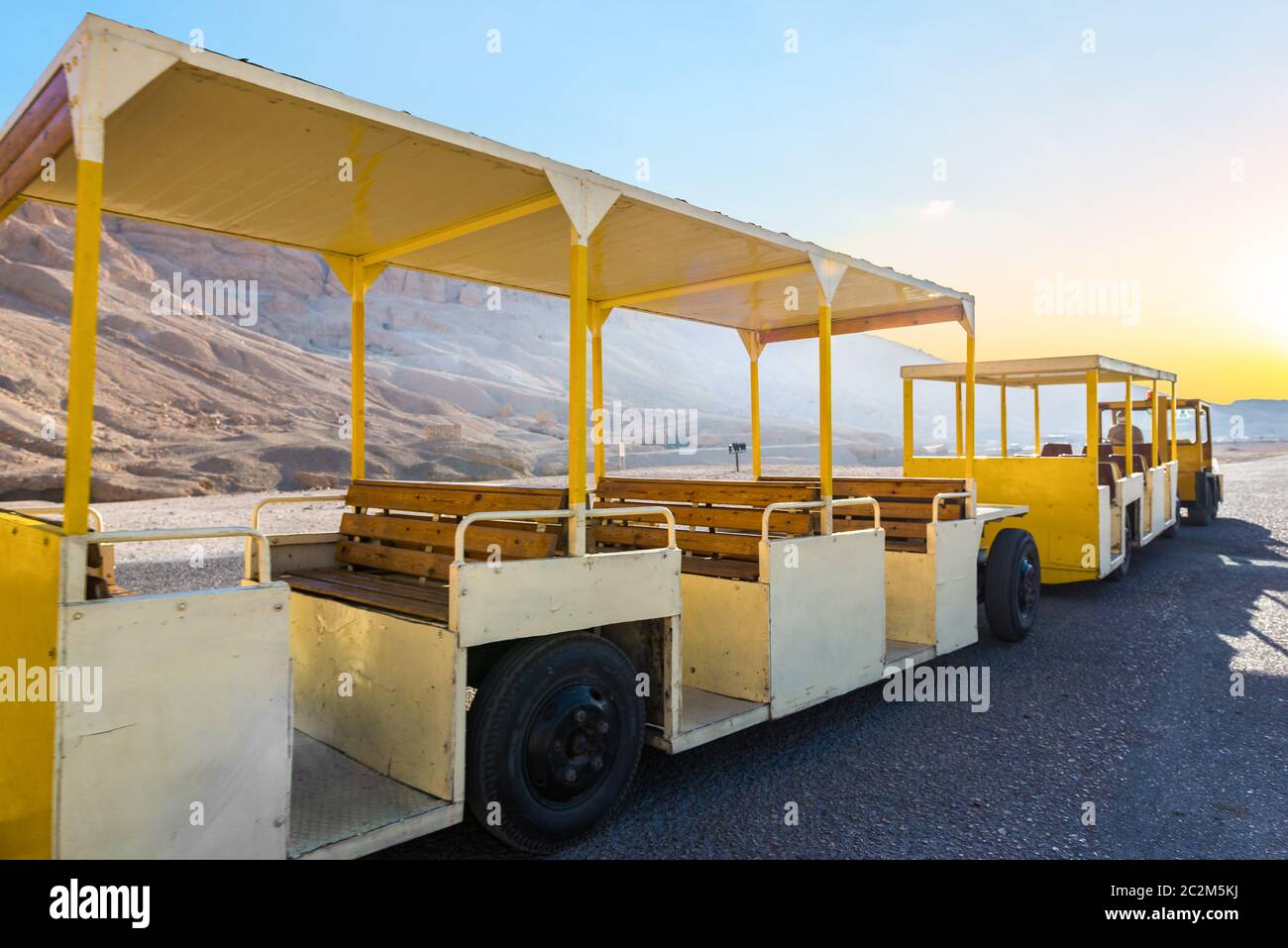 Touristic bus in desert of Luxor near Hatshepsut temple, Egypt Stock ...