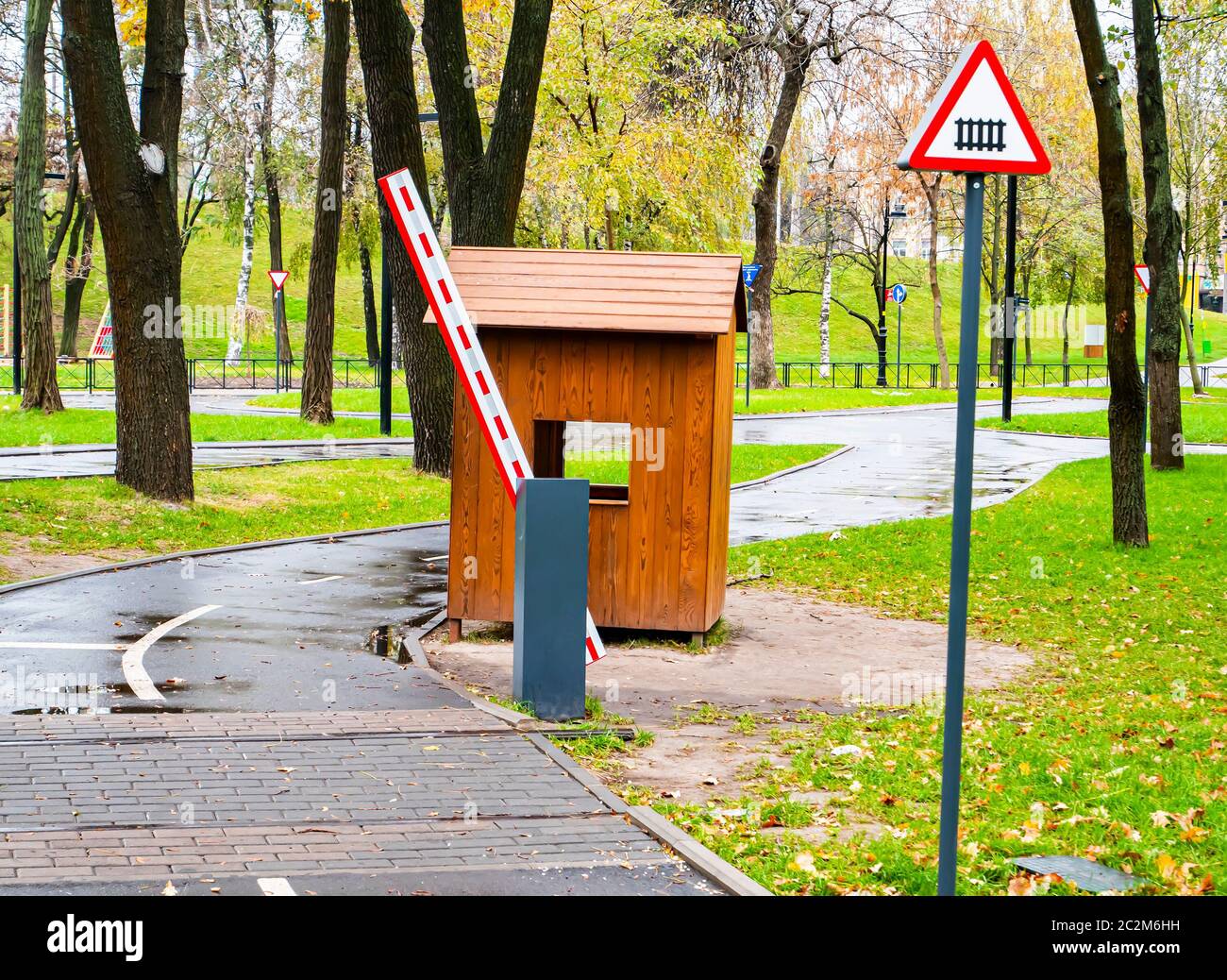 Railroad crossing through the road. Transport Stock Photo - Alamy