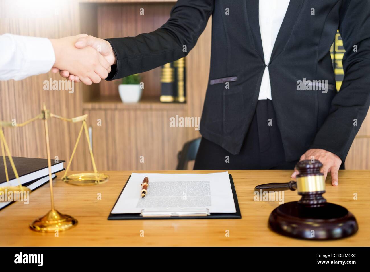 Judge lawyer shaking hands in hi-res stock photography and images - Alamy