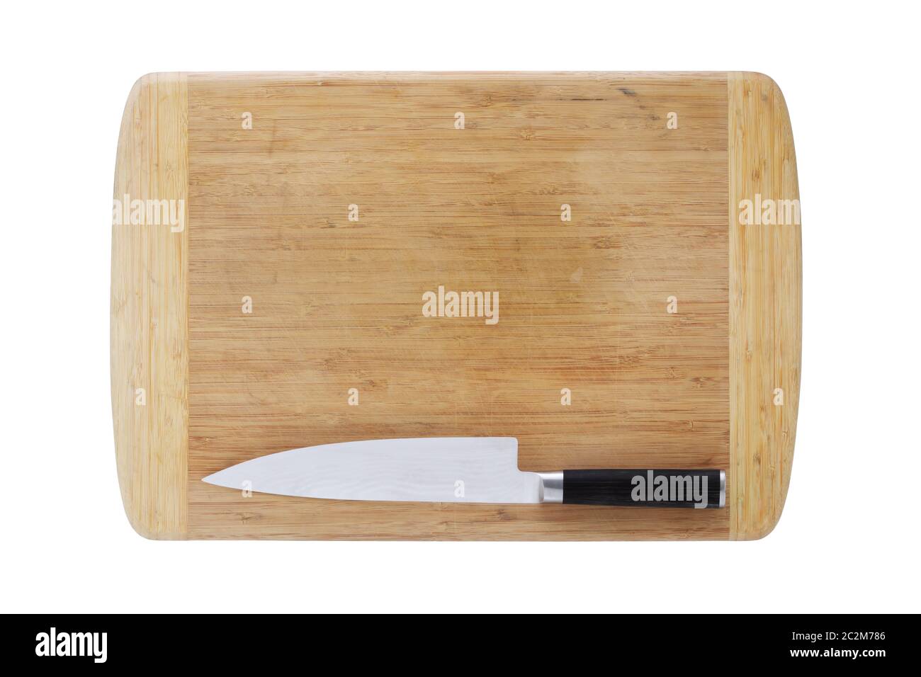 A wood chopping board and Japanese chefs knife isolated on white with ...