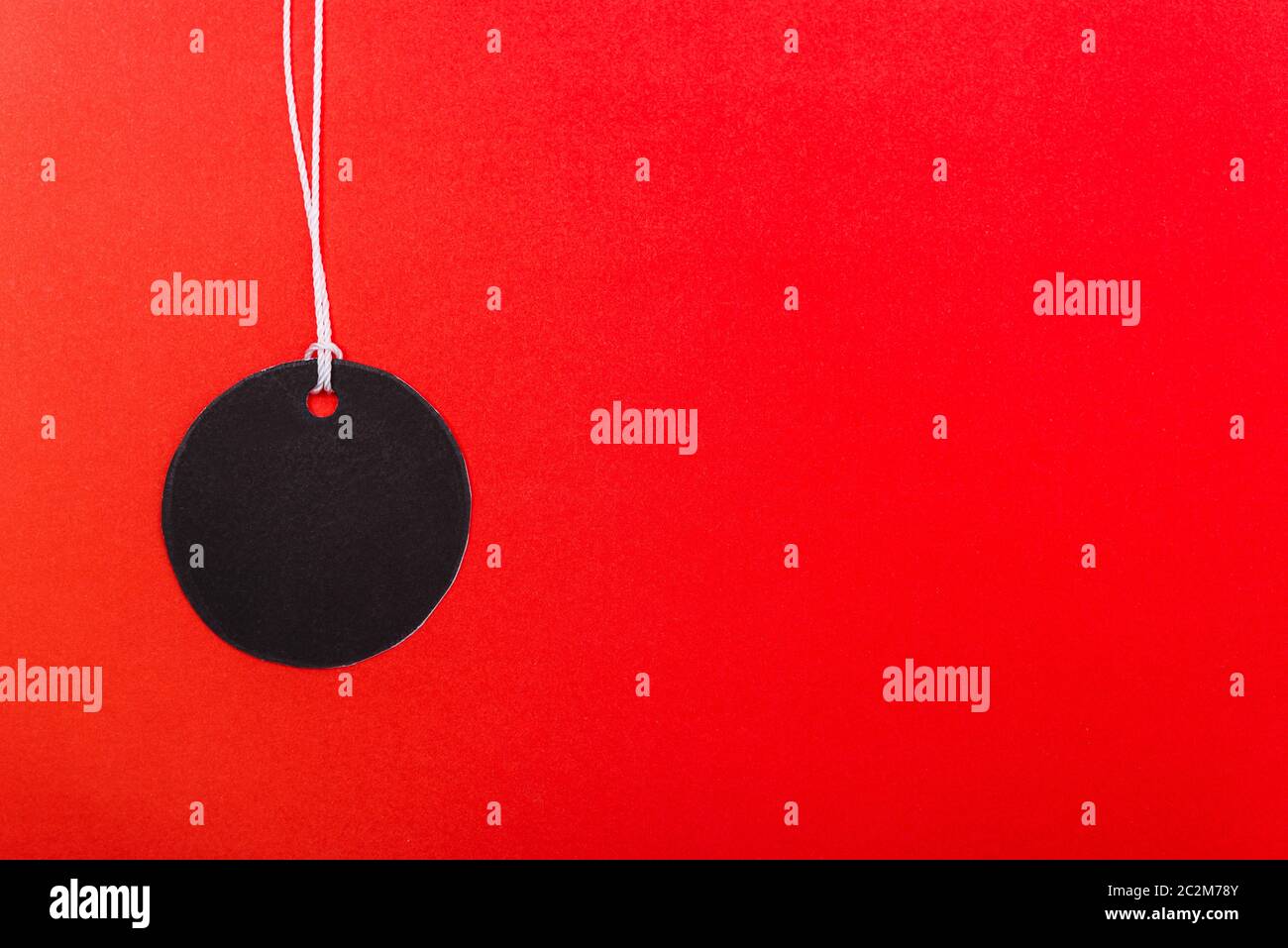 Circle Black tag label on red background, with copy space Stock Photo ...