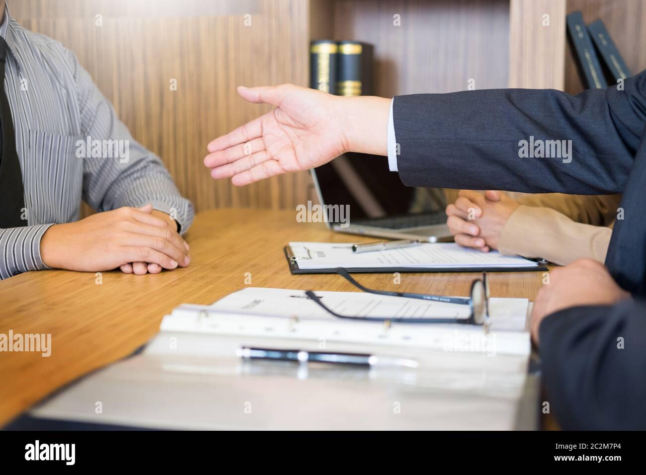 Job applicant having interview. Business young candidate people shaking ...